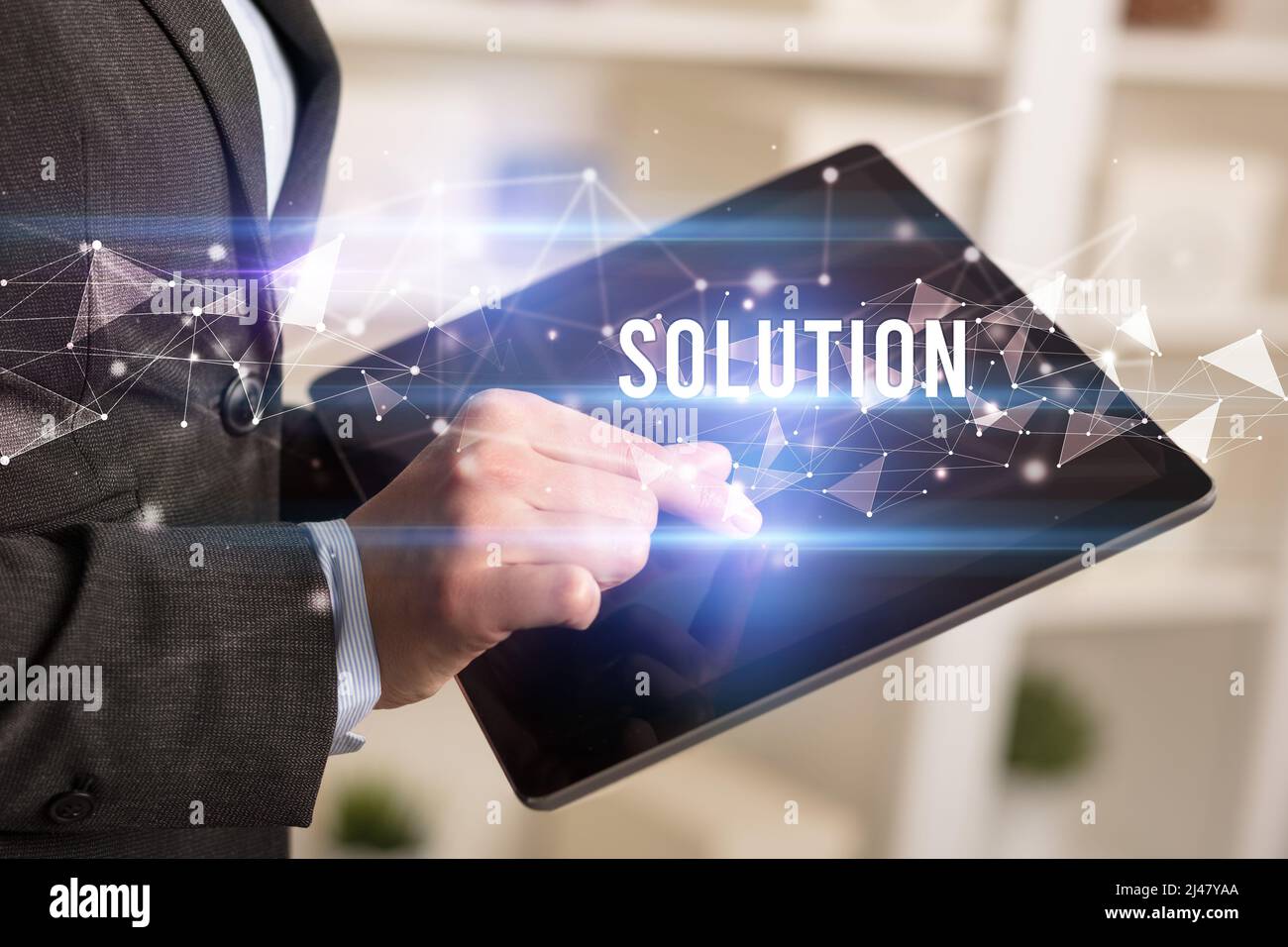 Close up hands using tablet Stock Photo - Alamy