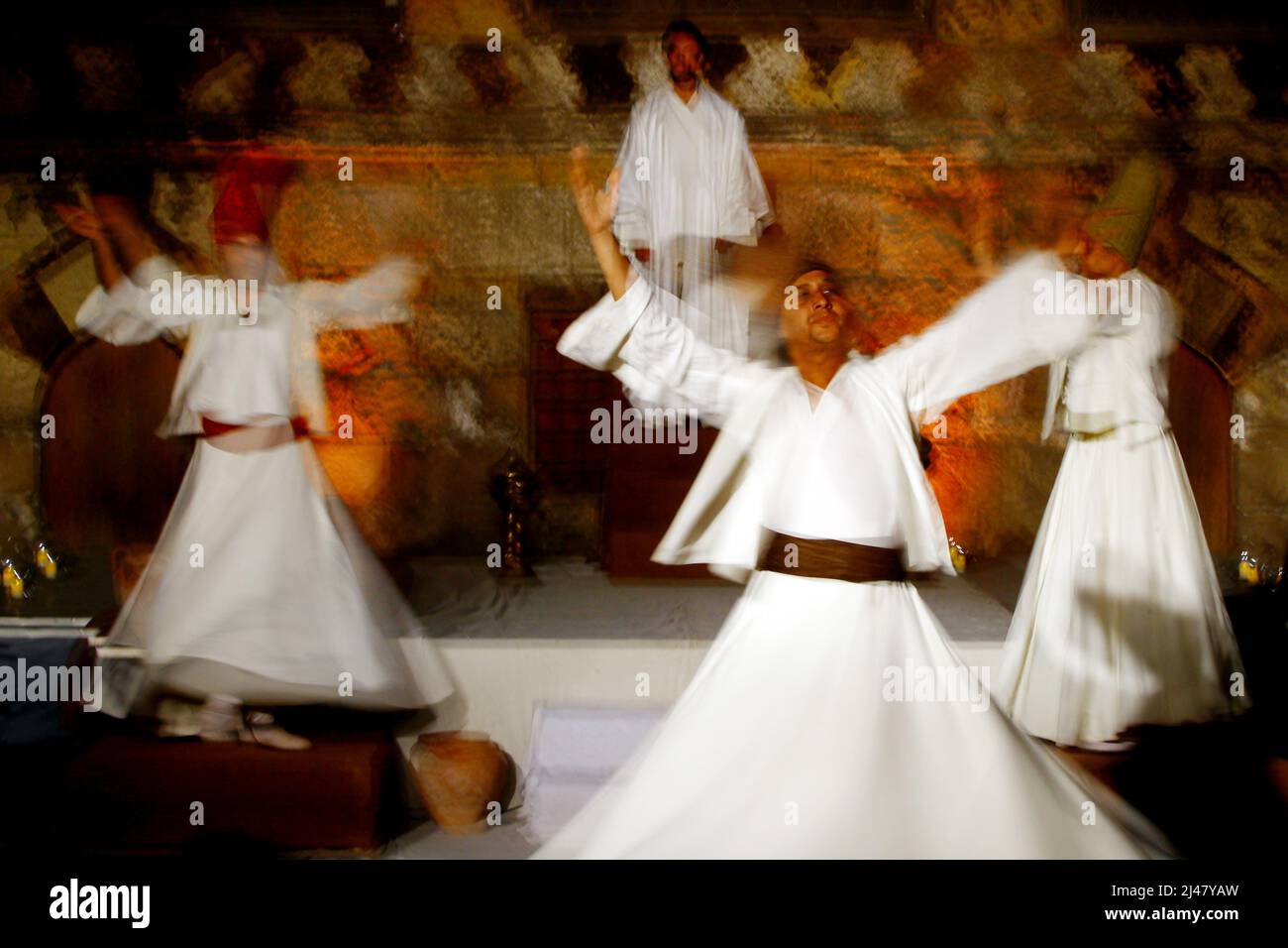 Cairo, Egypt. 12th Apr, 2022. Dancers perform Sufi dance at the Sultan ...