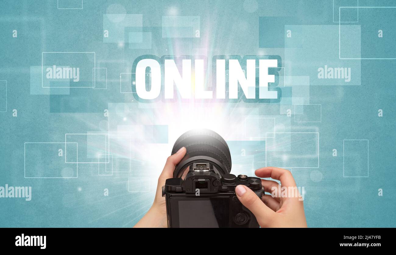 hand holding digital camera, traveling concept Stock Photo - Alamy