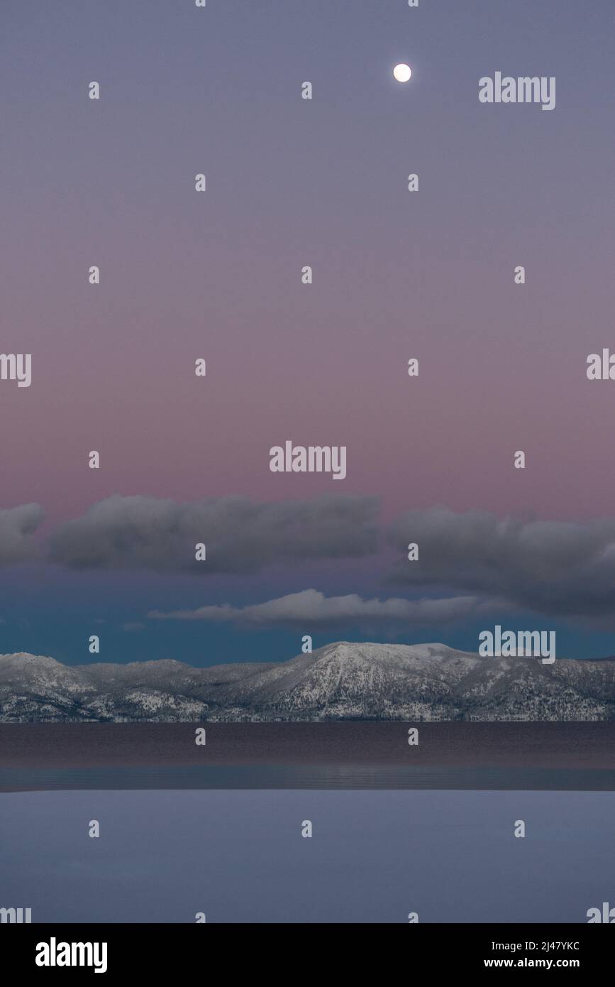 Full moon rising over Lake Tahoe at dusk Stock Photo - Alamy