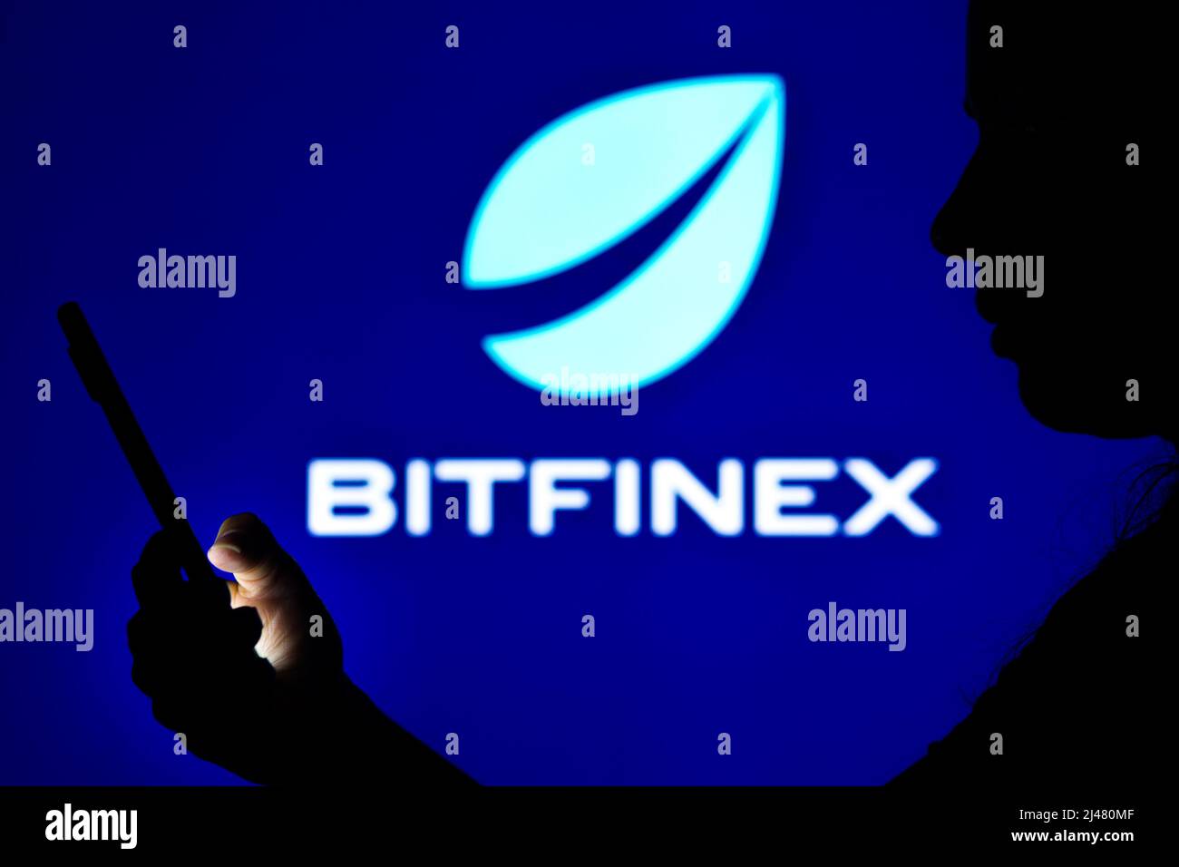 Brazil. 12th Apr, 2022. In this photo illustration, a woman's silhouette holds a smartphone with ...