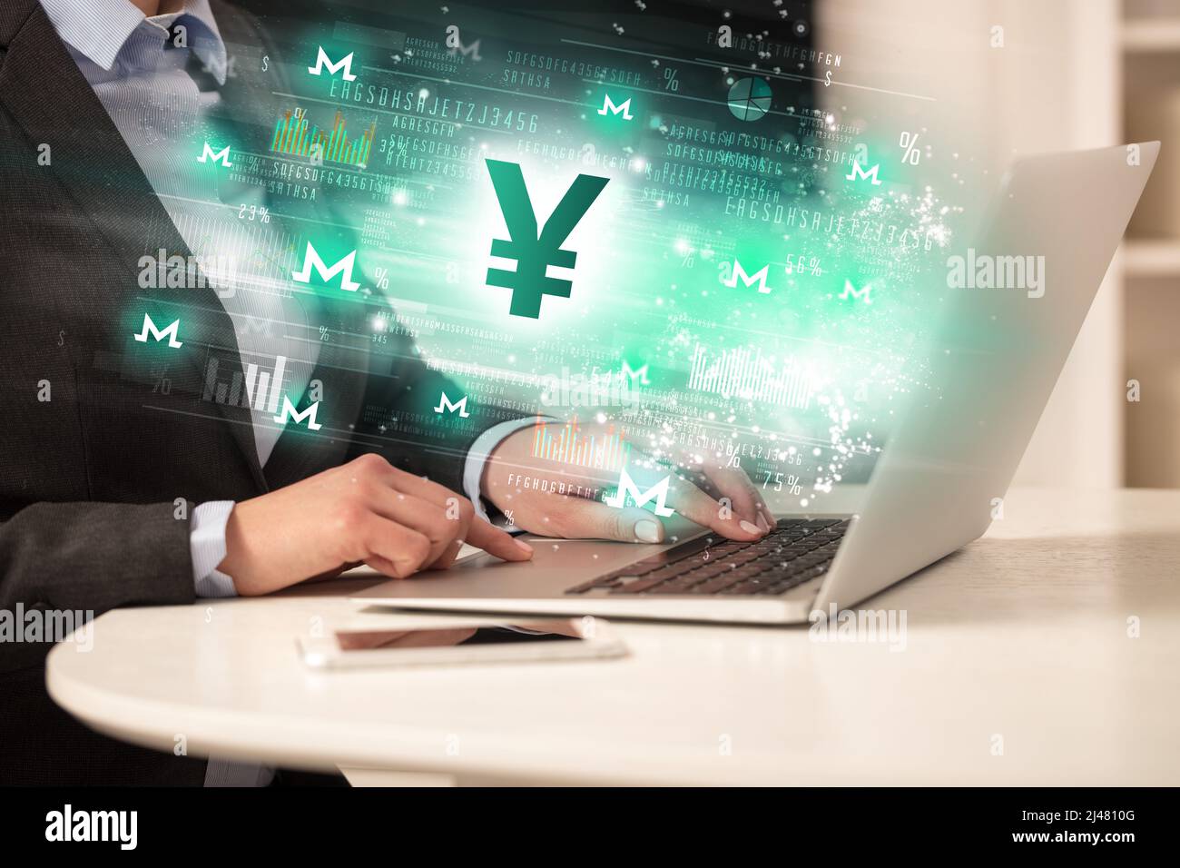 Young man watching stock market on laptop Stock Photo - Alamy