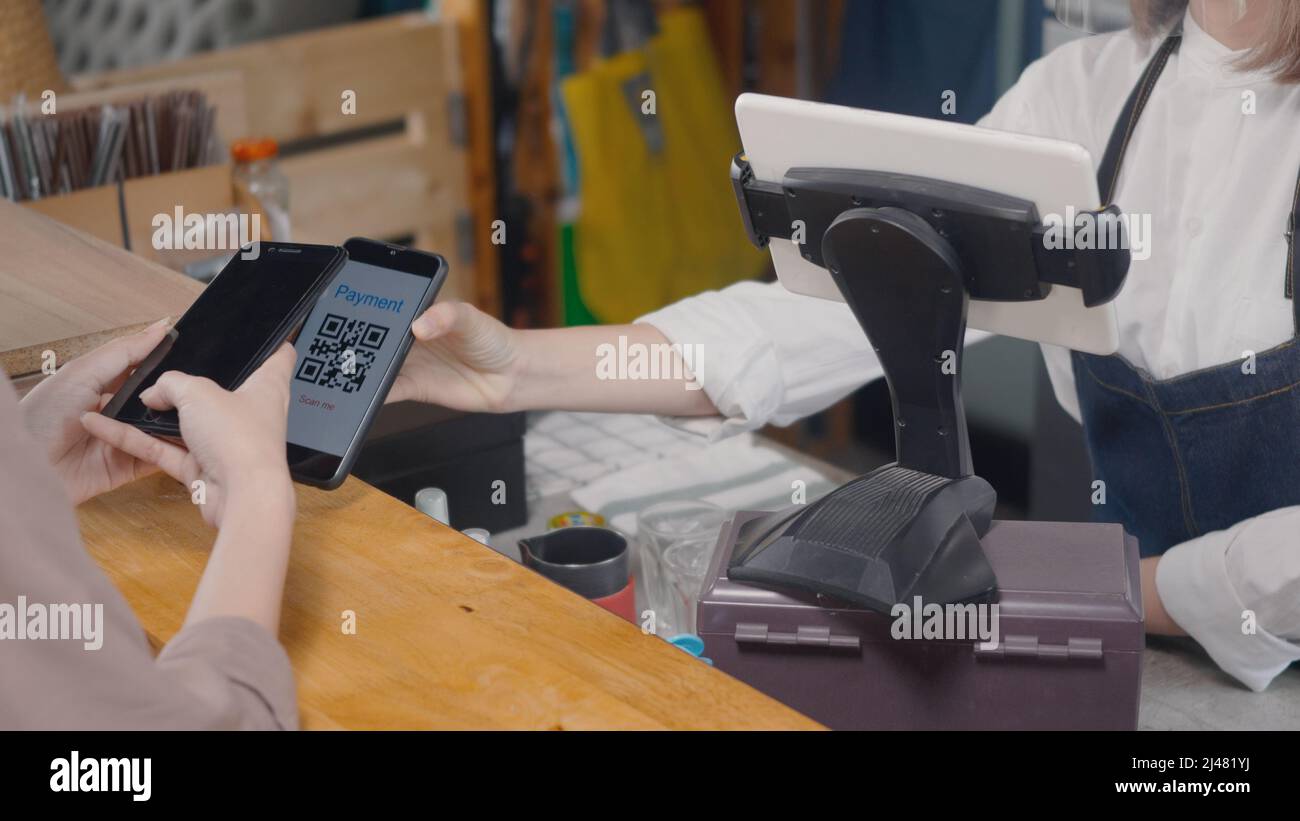 QR code payment, customer woman using digital smartphone application ...