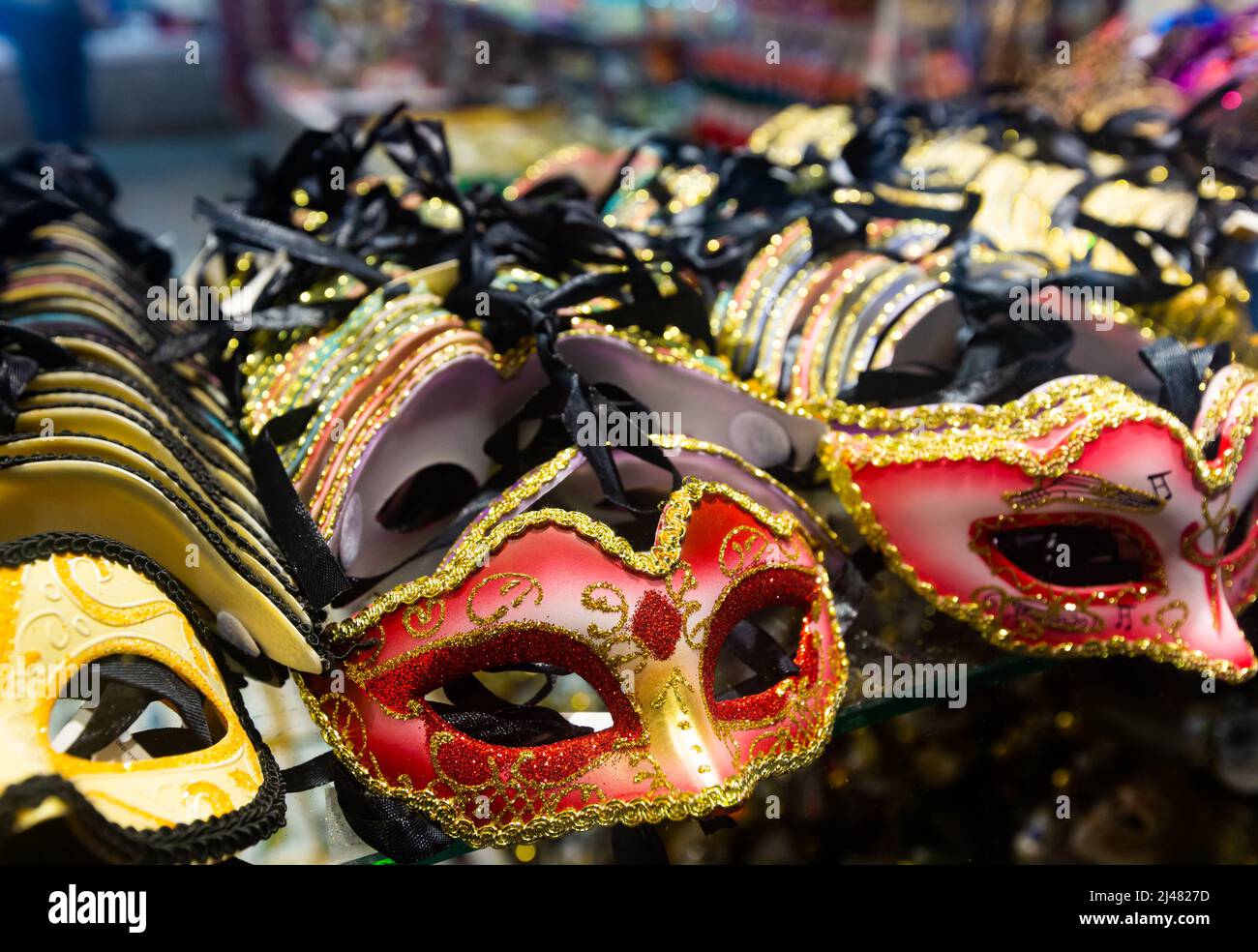 Traditional venician masks on shelves in shop in Venice Stock Photo - Alamy