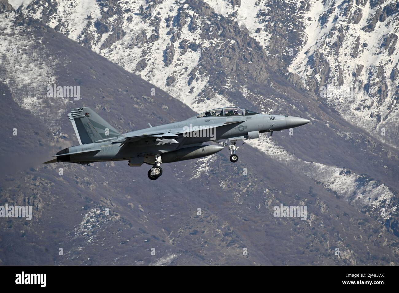 An F/A-18F Super Hornet a performs a “touch and go” during a series of ...