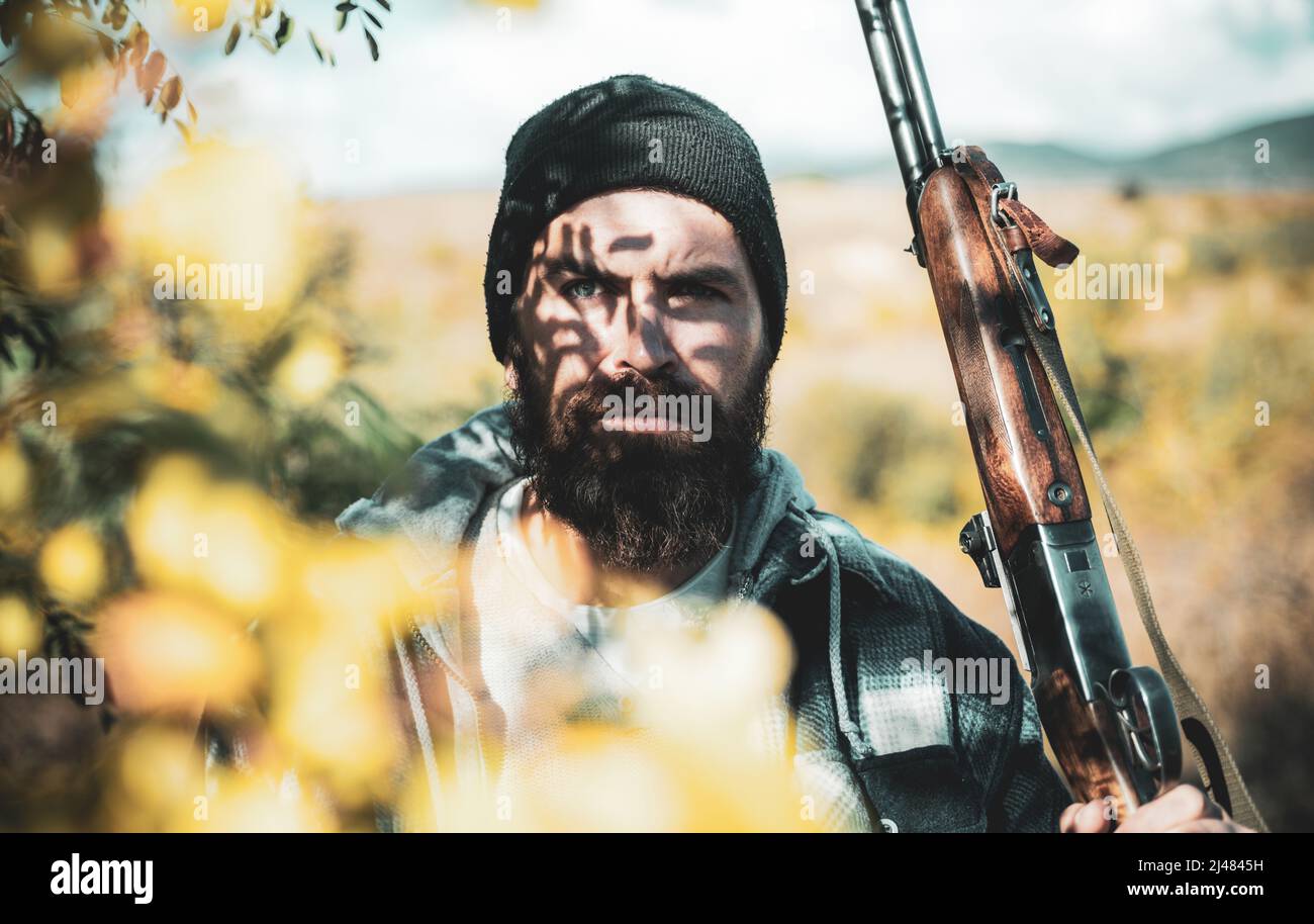 Portrait of hamdsome Hunter. Hunter with shotgun gun on hunt. Man ...