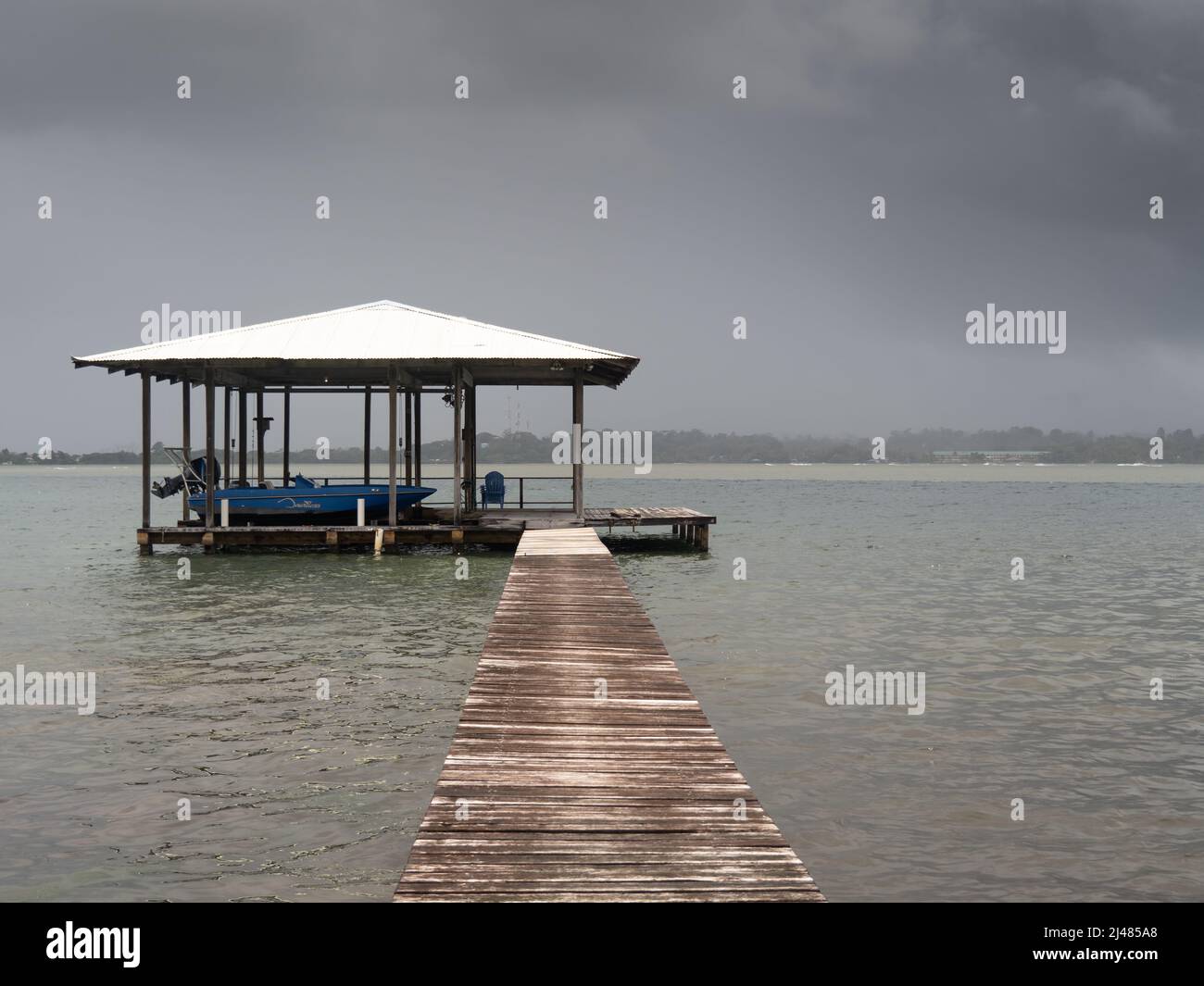 Dramatic dock and sky with approaching tropical storm Stock Photo - Alamy
