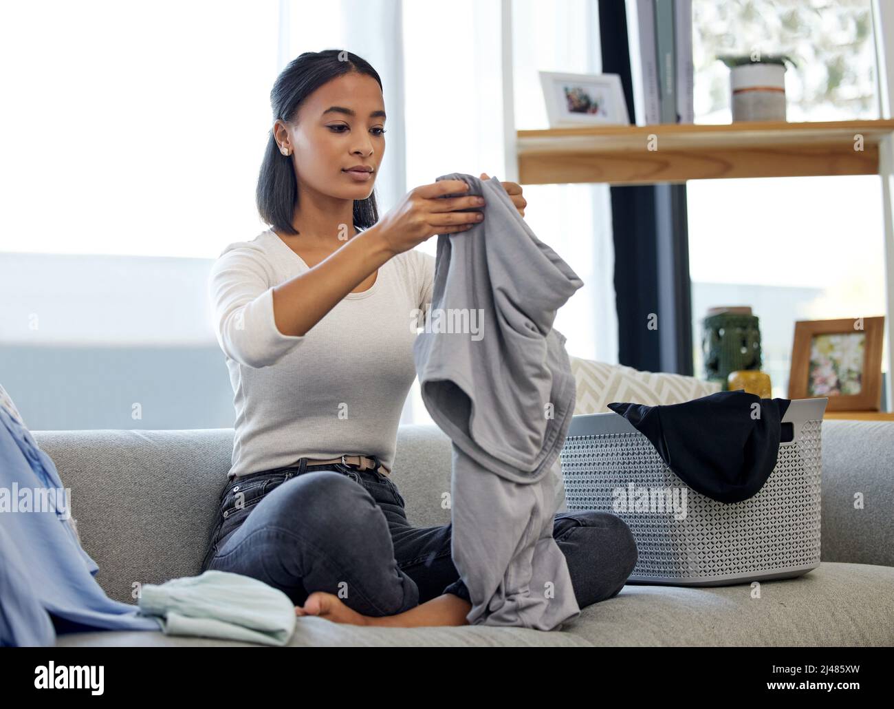 Boy Put Away Laundry Clipart