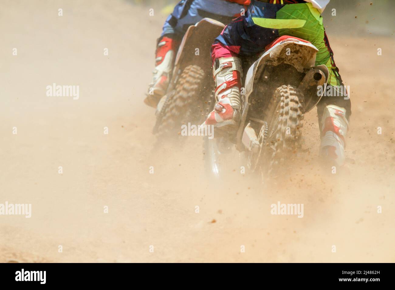 motocross racer accelerating speed in track Stock Photo - Alamy