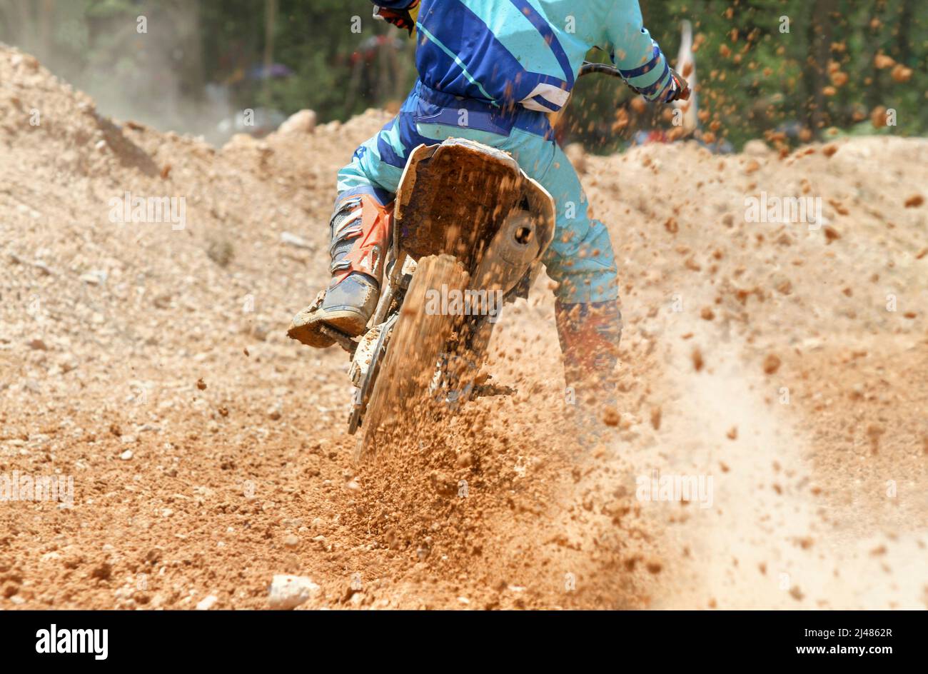 motocross racer accelerating speed in track Stock Photo - Alamy