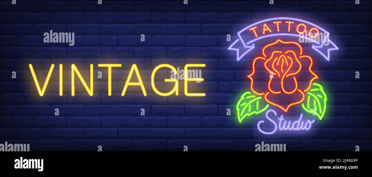 Vintage tattoo studio neon sign. Red rose on bright inscription on dark ...