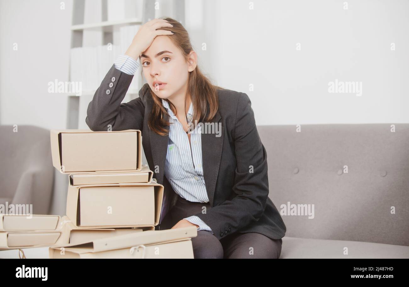 Busy business woman, secretary girl working alone late in office. Angry ...