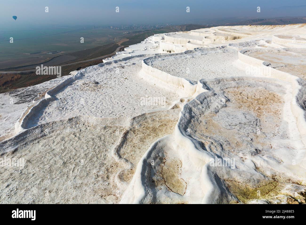Natural travertine terraces with hot springs in Pamukkale, Turkey Stock ...
