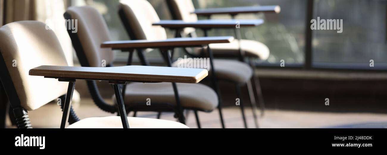 Empty chairs standing in conference room closeup Stock Photo - Alamy