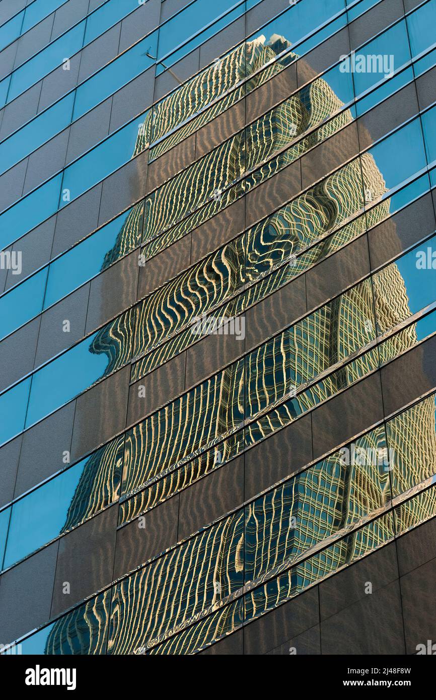 2ifc reflected in the facade of Exchange Square, Central, Hong Kong ...