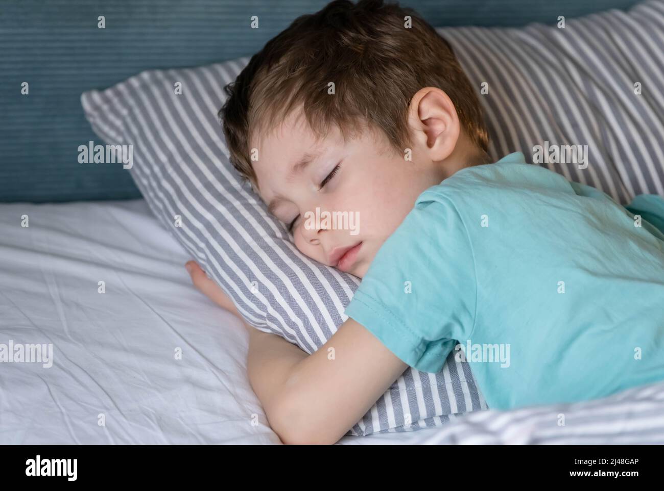 Little boy sleeping. Sleeping child in bed. Little baby napping Stock ...