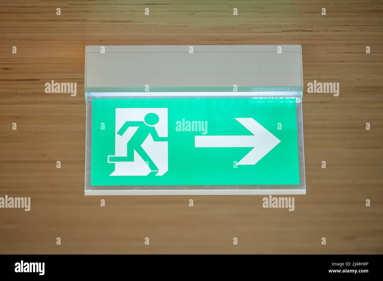 Schiltach, Germany. 11th Apr, 2022. An illuminated emergency exit sign ...