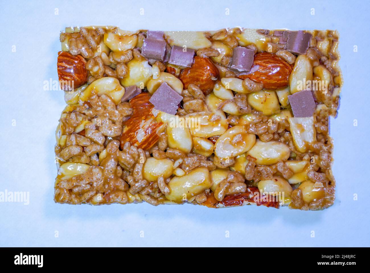 Bar sweet with nuts and caramel photographed in the studio Stock Photo ...
