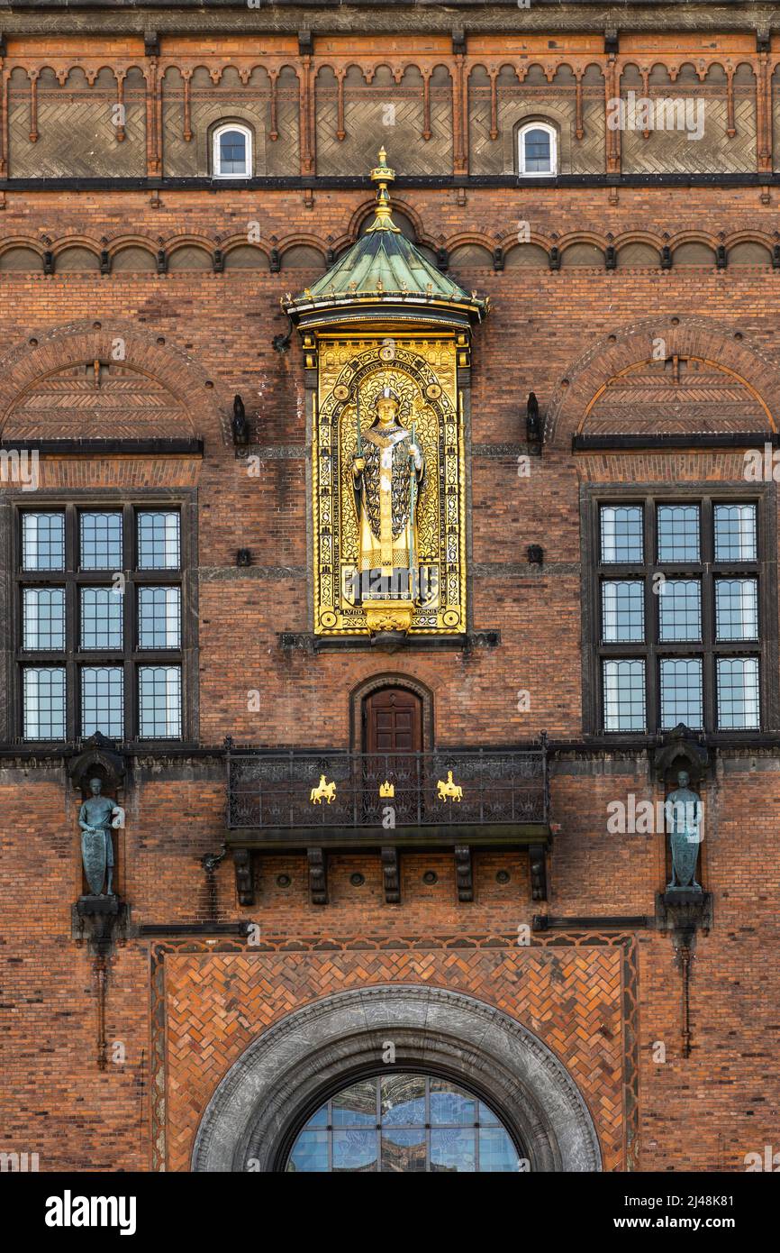 Above the main entrance to Copenhagen City Hall is a statue of the city ...