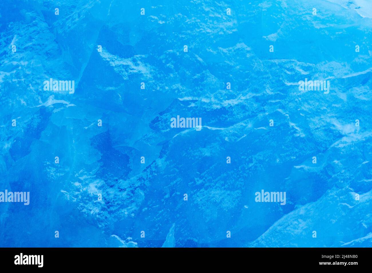 Blue ice wall. Blue ice and mountain. Winter Arctic. White snowy ...