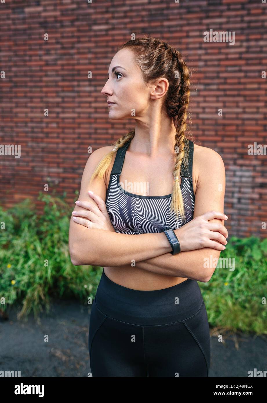 Woman crossed arms hi-res stock photography and images - Alamy