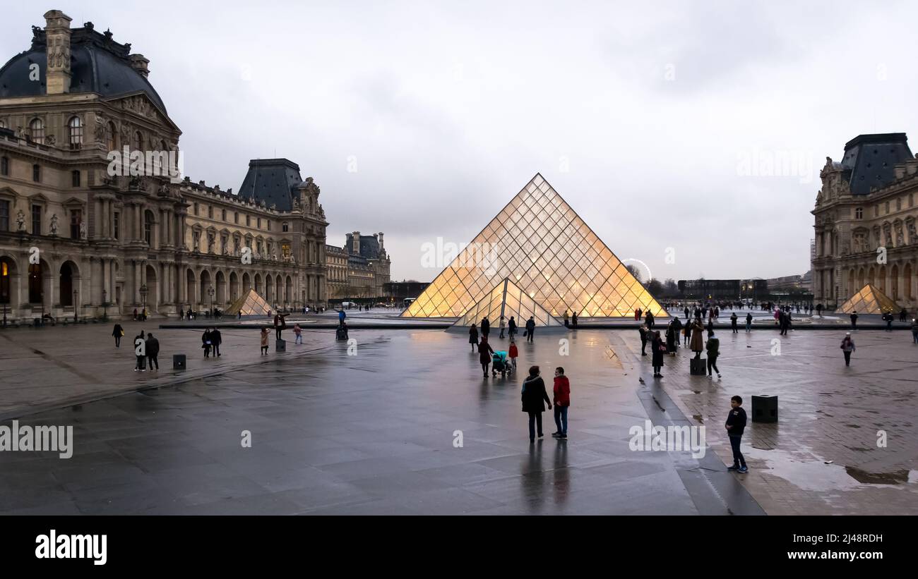 Urban landscape of a sunset at the Louvre Palace, an iconic building of ...