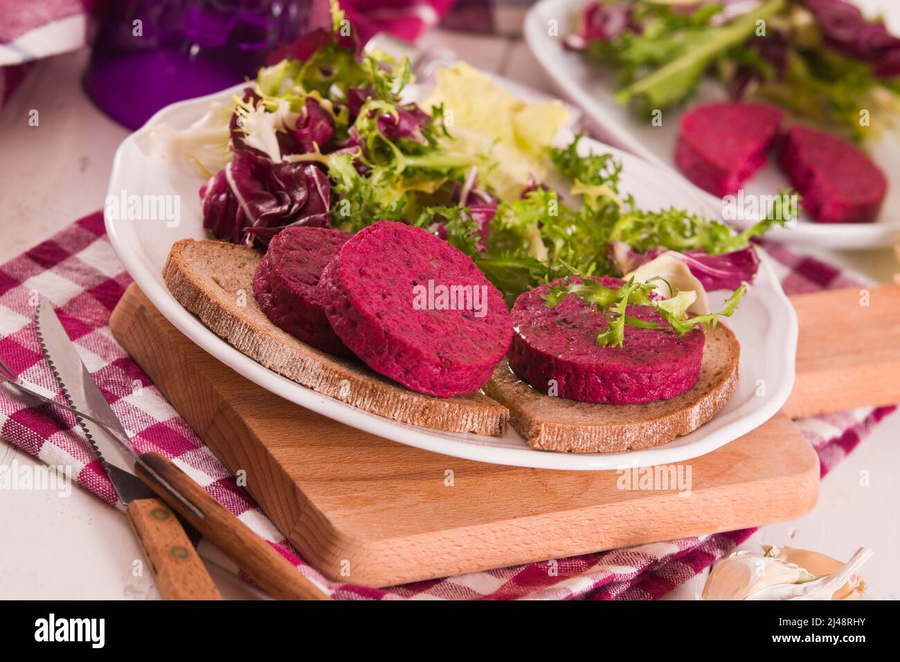 Beetroot veggie burger Stock Photo - Alamy