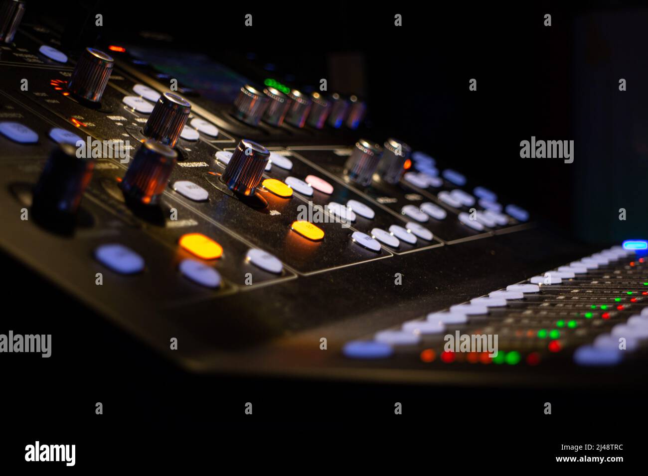 close-up ambient shoot of a modern digital audio mixing device for ...