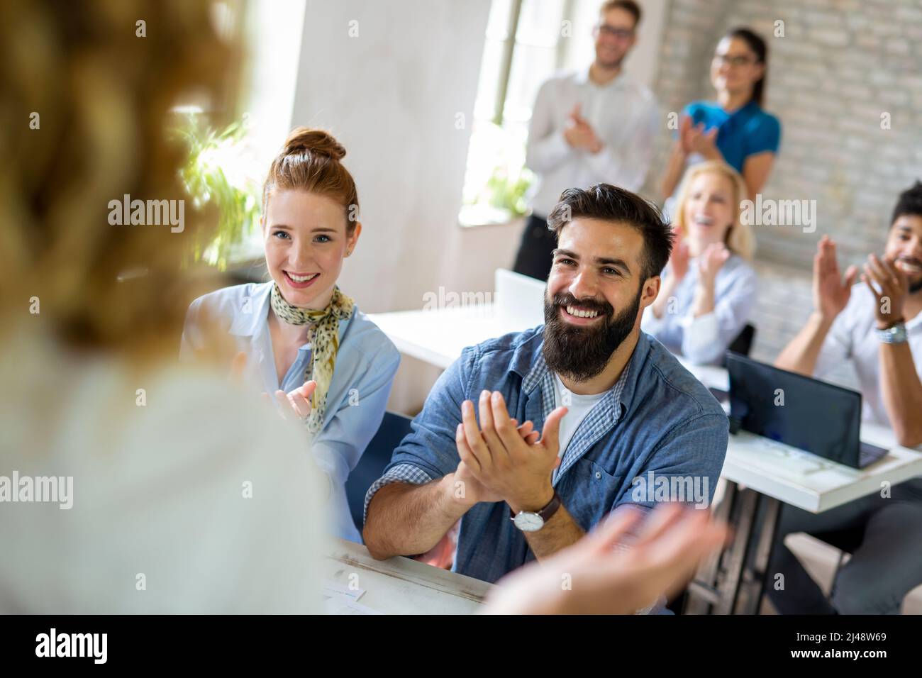 Group of success people working together at corporate workplace ...