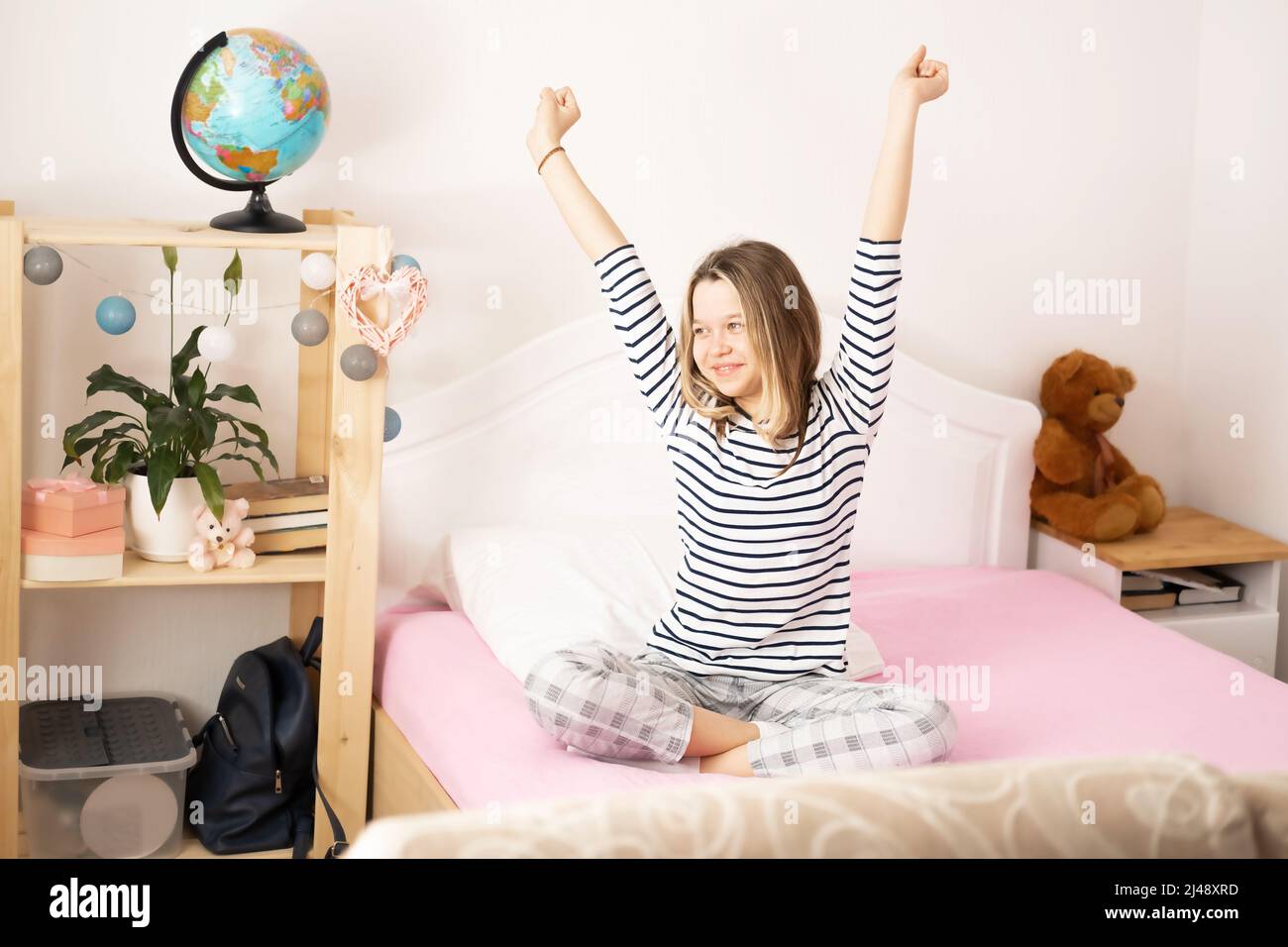 Girl waking up bed teen hi-res stock photography and images - Alamy