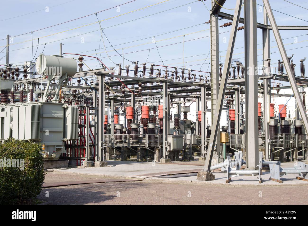 Closeup of high voltage electrical components of an substation in ...