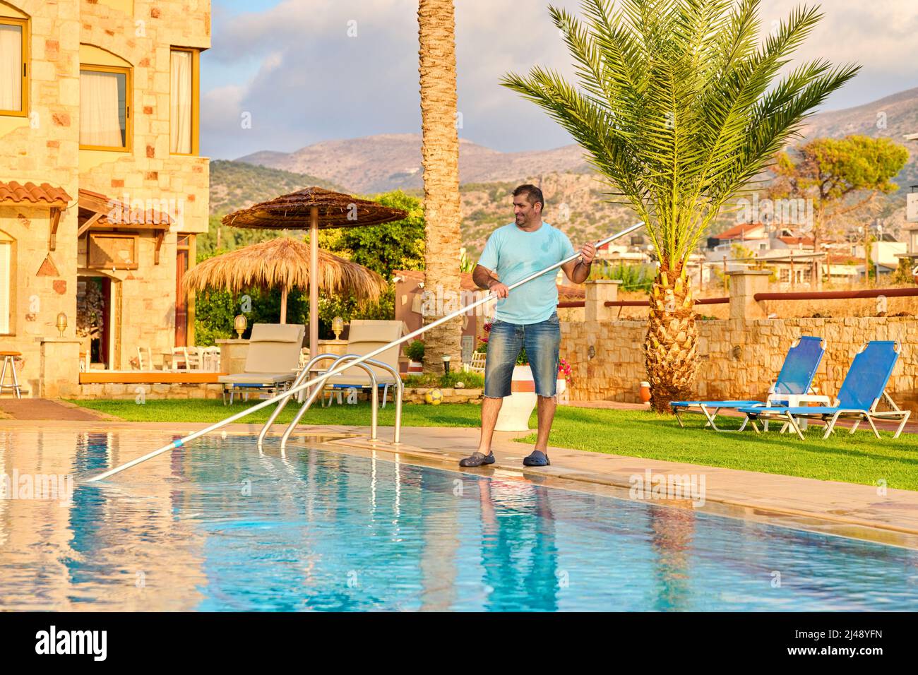 Man skimmer pool hi-res stock photography and images - Alamy