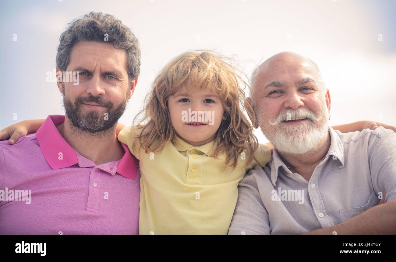 Men generation portrait of grandfather father and son child. Fathers ...