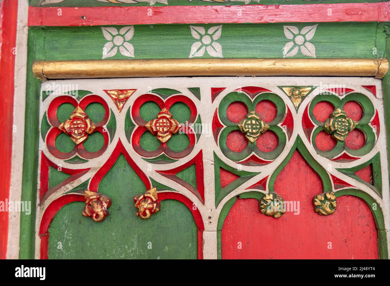 Decorated wooden rood screen in the Saxon church of All Saints ...
