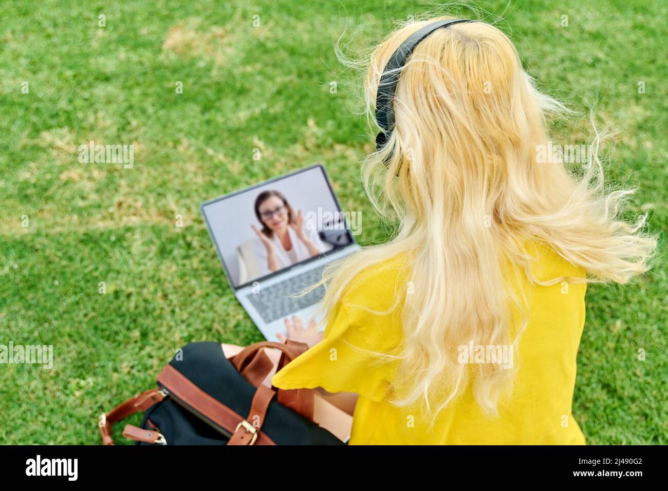 Remote online lecture on laptop screen, web chat with teacher and ...