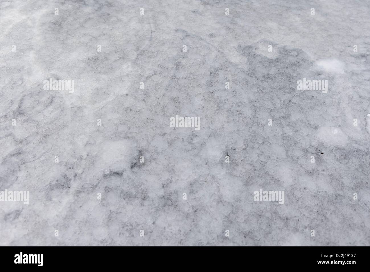 Shallow water covered with salt crystals at the Jan Thiel Salt Flats on ...