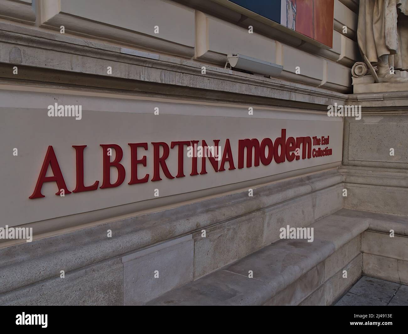 Close-up view of red colored lettering of art museum Albertina modern ...