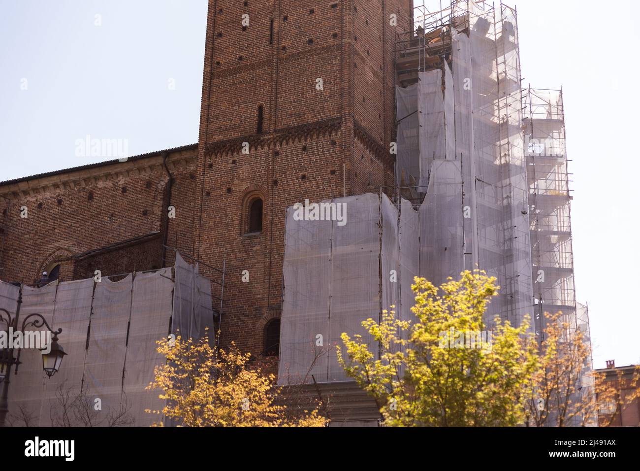 an old brick building in italy with scaffolding Stock Photo - Alamy