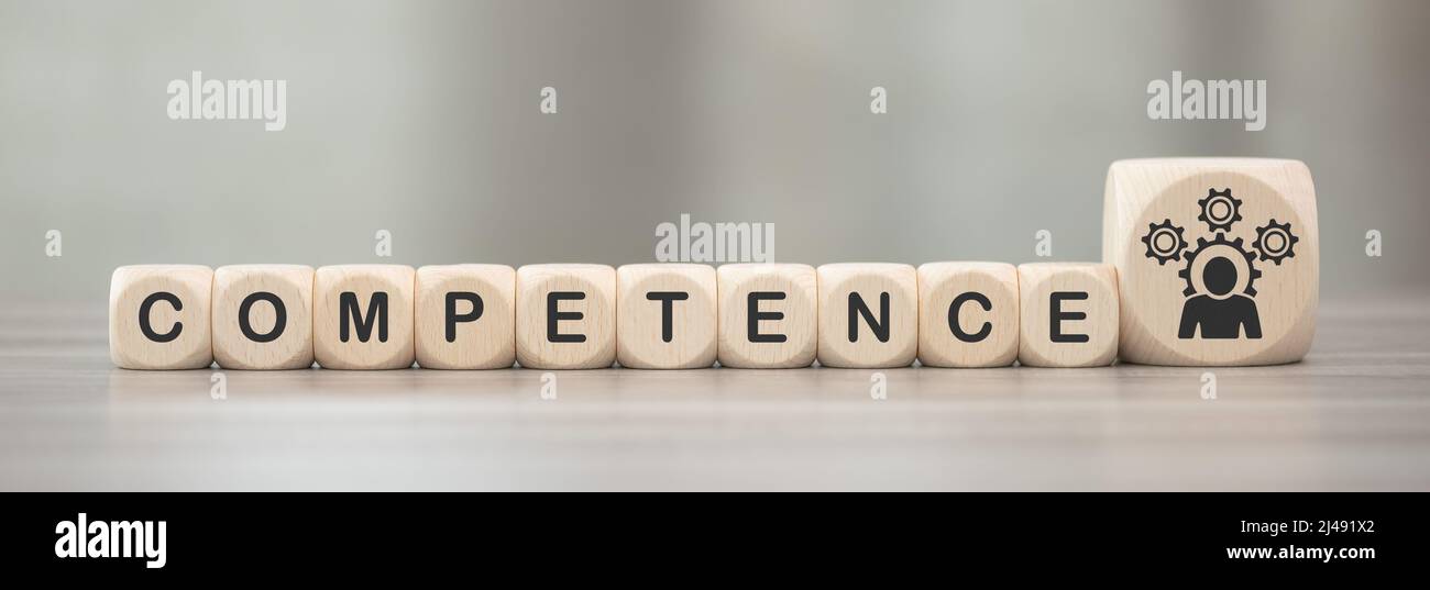 Wooden blocks with symbol of competence concept Stock Photo - Alamy