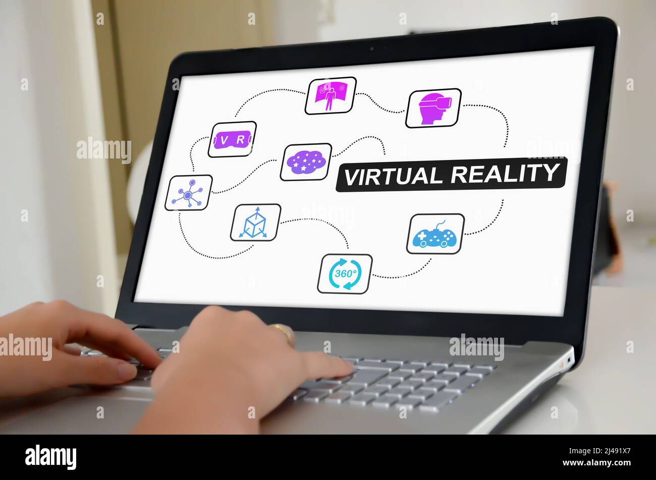 Hands on a laptop with screen showing virtual reality concept Stock ...