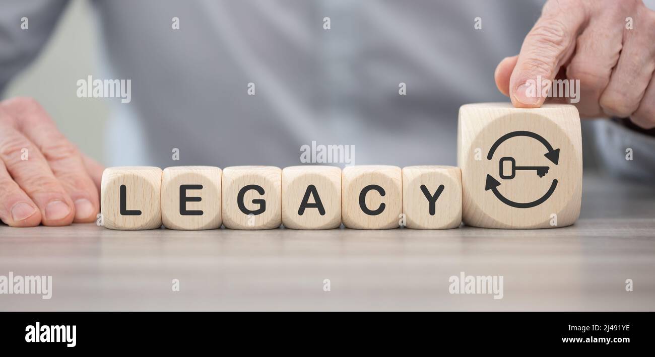 Wooden blocks with symbol of legacy concept Stock Photo - Alamy