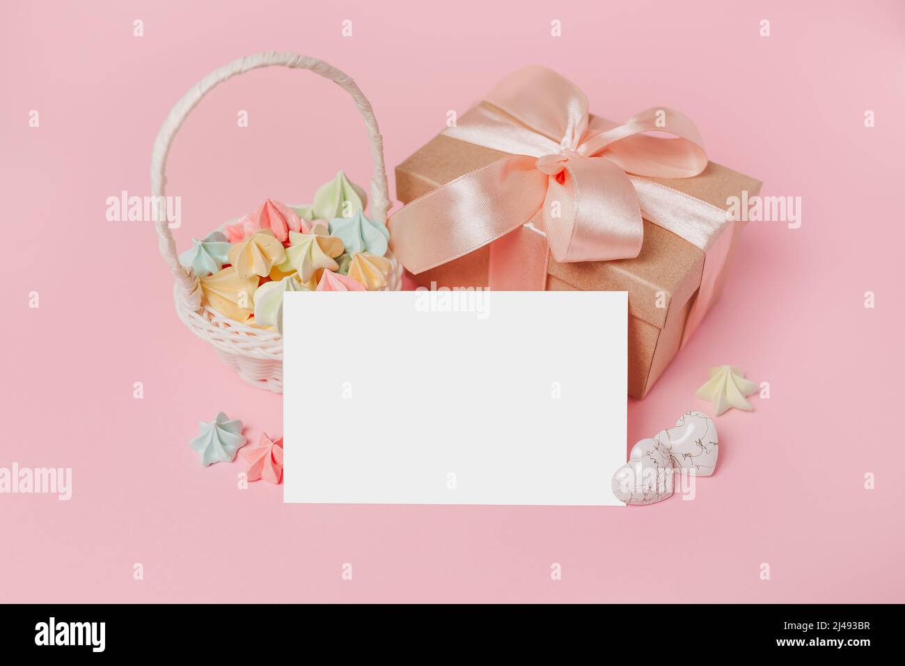 Gifts with note letter on isolated pink background with sweets, love ...