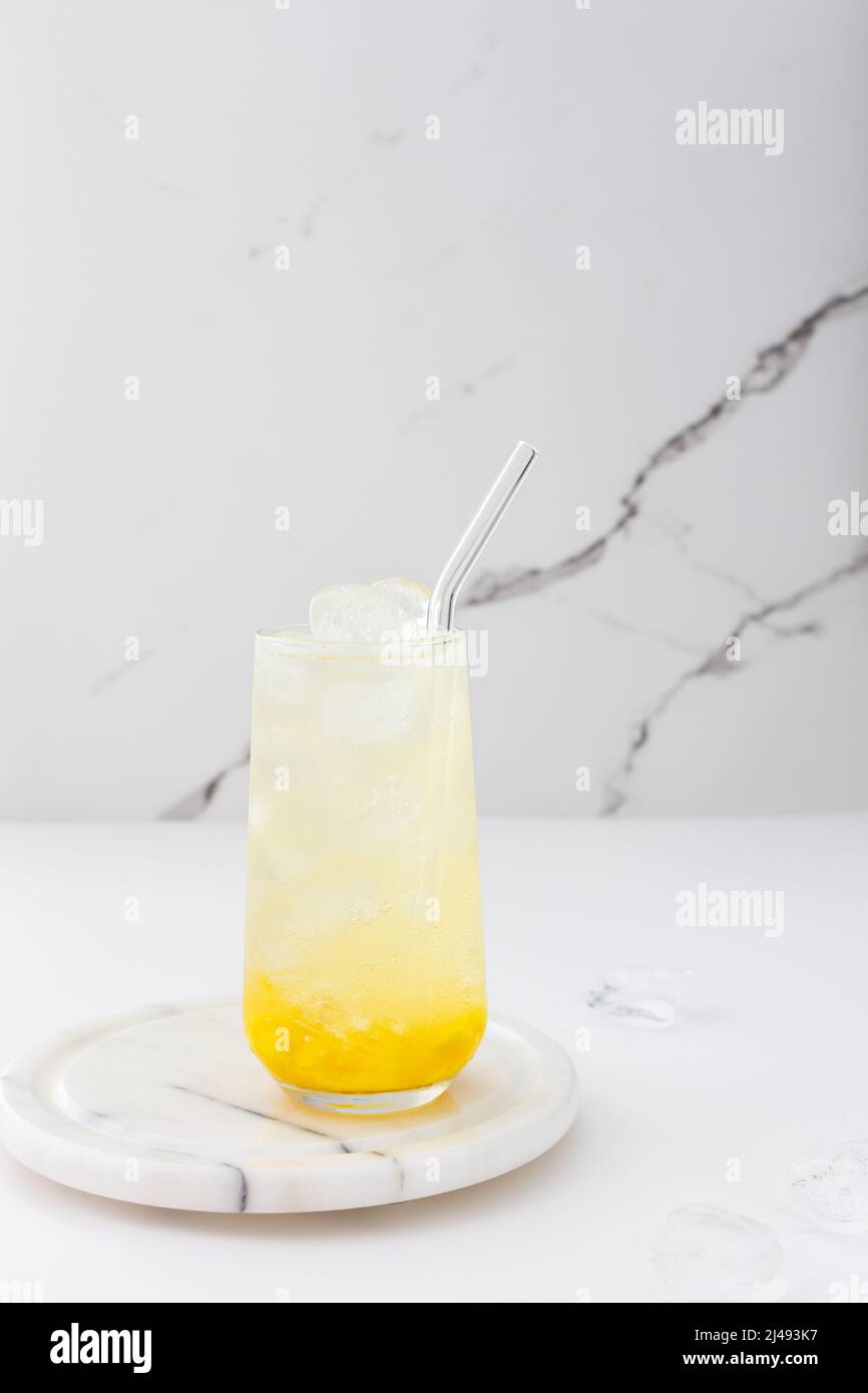 Refreshing drink with mango pulp in a glass on the background of a ...