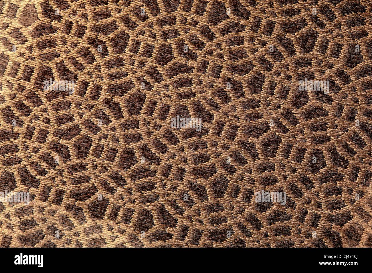 Abstract circular print background on cotton fabric in golden brown ...