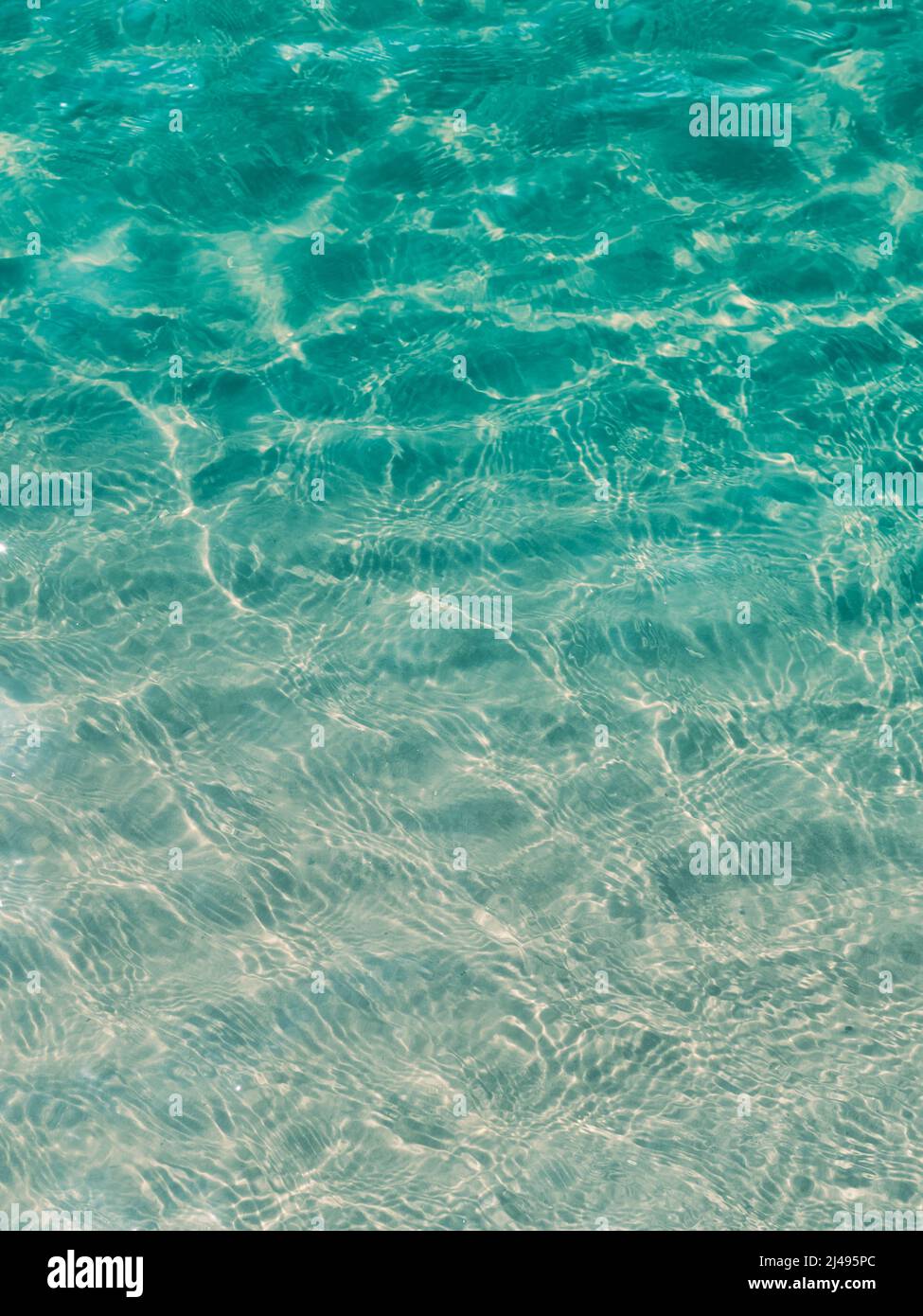 Surface transparent blue sea water Stock Photo - Alamy