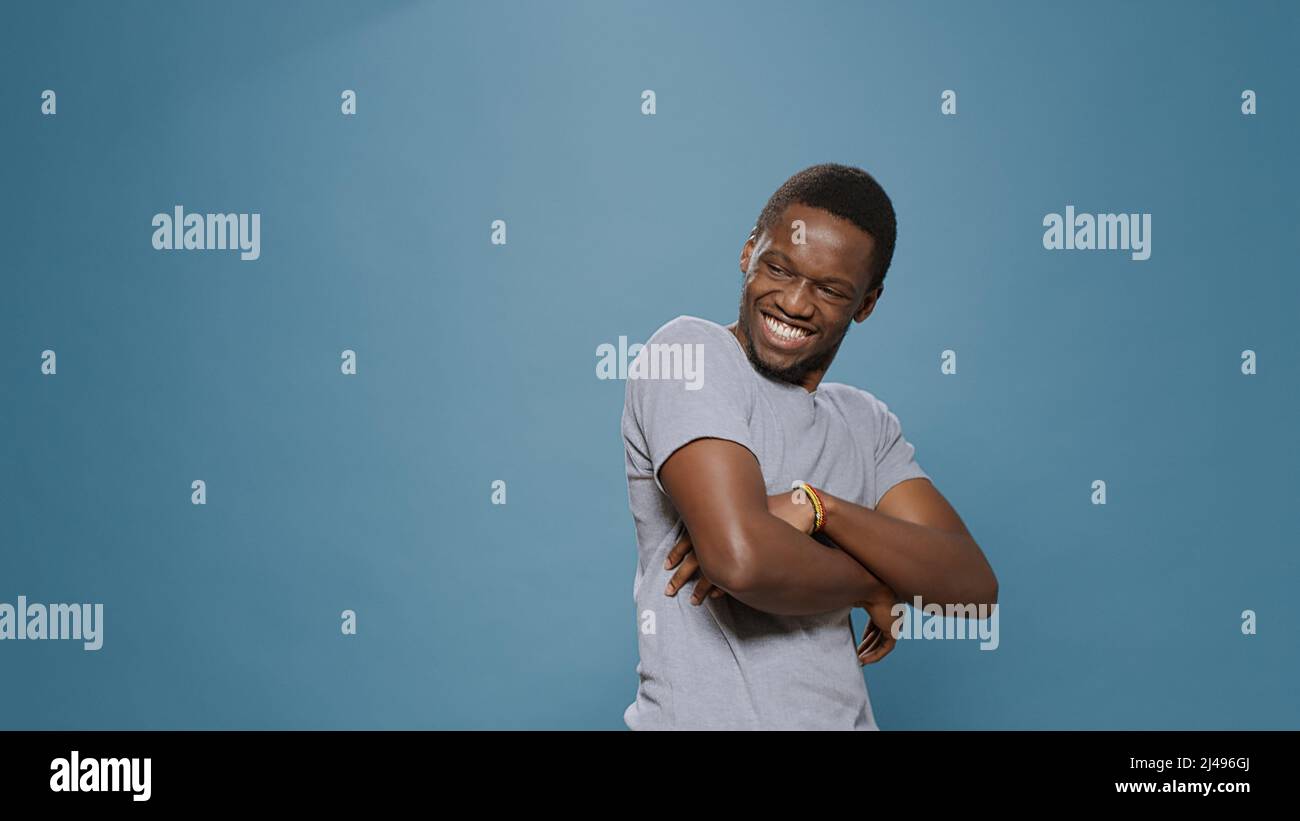 Happy adult doing hip hop dance moves in front of camera, doing cool ...