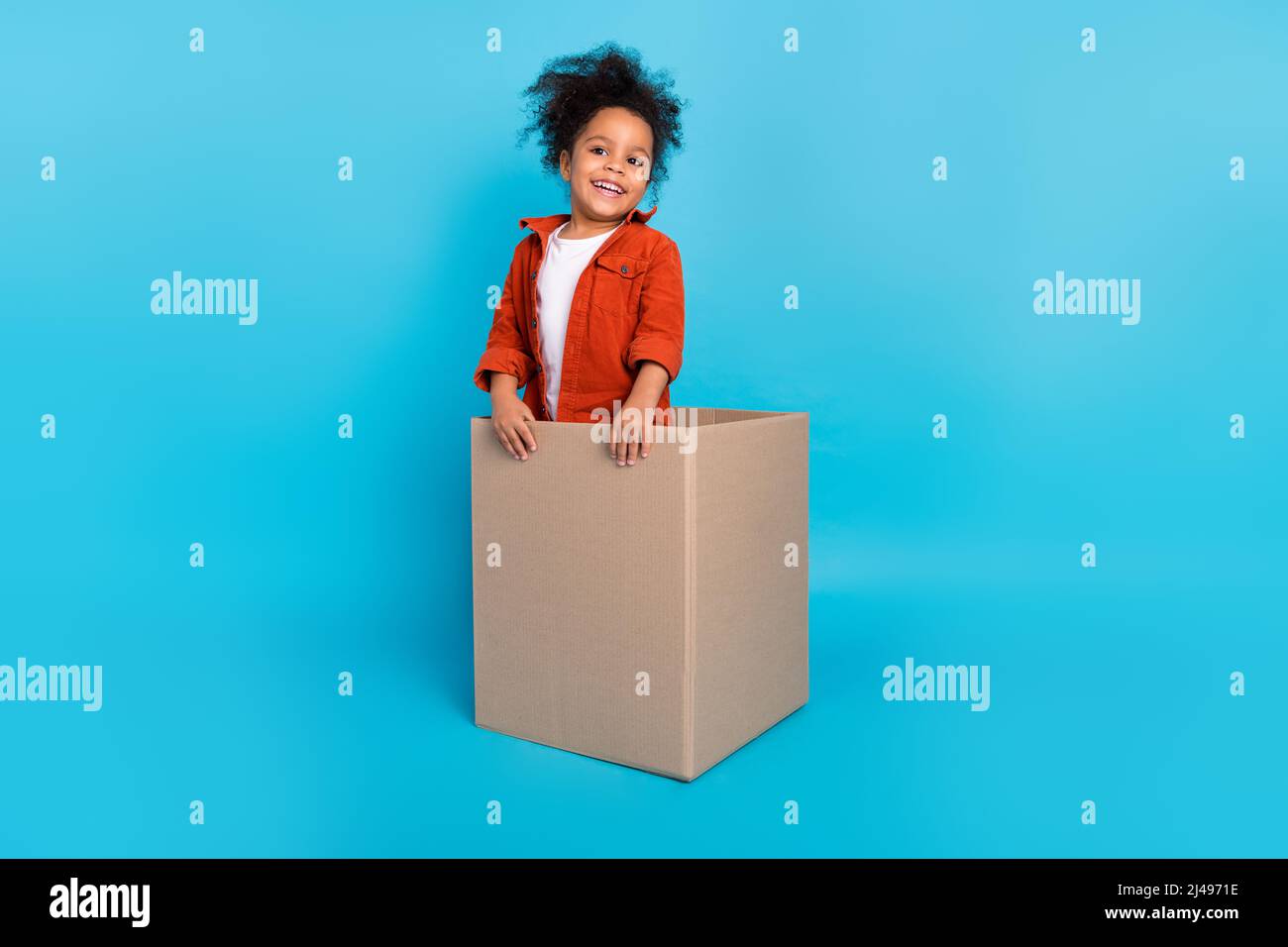 Full body photo of funky wavy small girl in box wear brown shirt ...