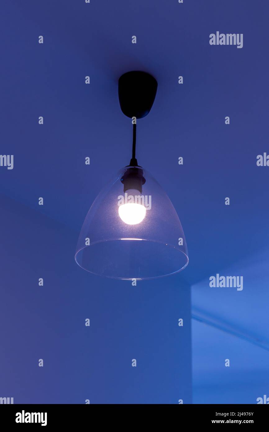 Ceiling lamp in blue light. Ceiling lamp Stock Photo - Alamy