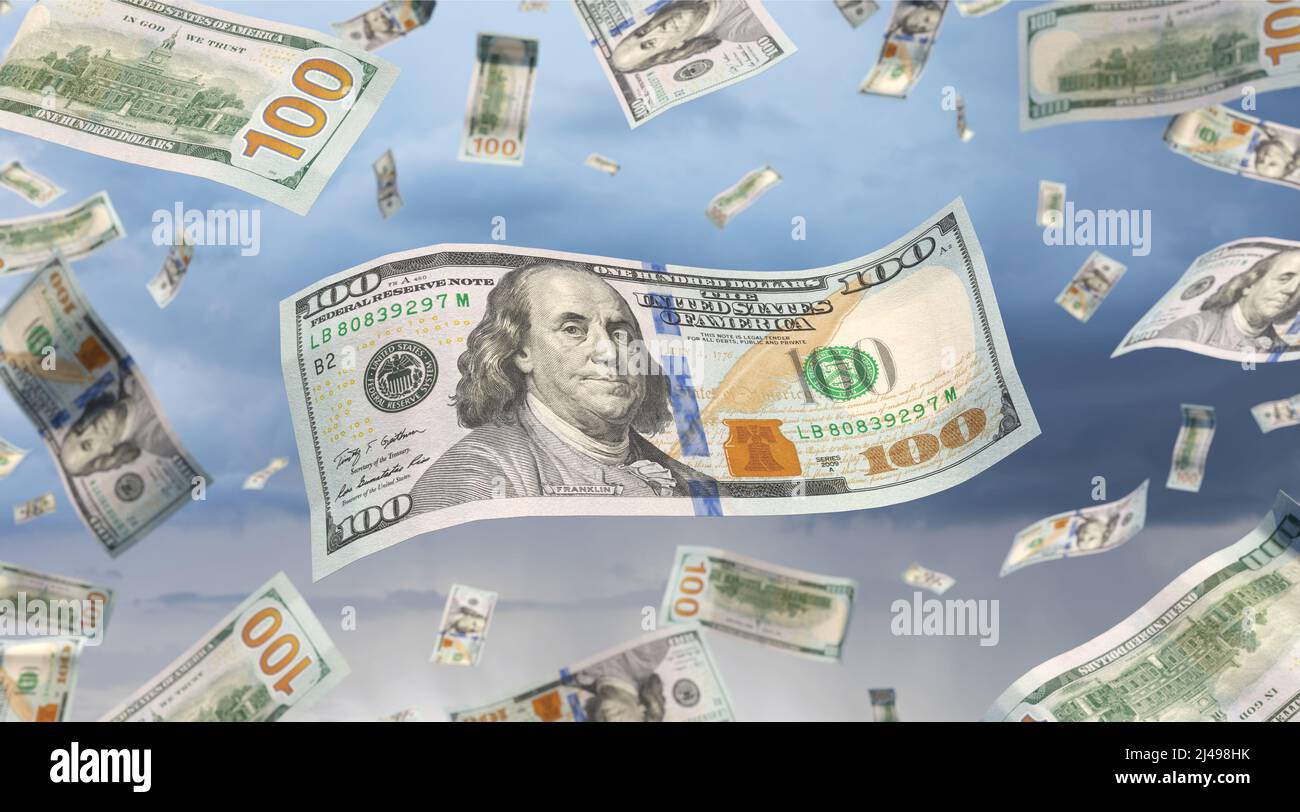 Rain of money - US dollars fall from the sky Stock Photo - Alamy