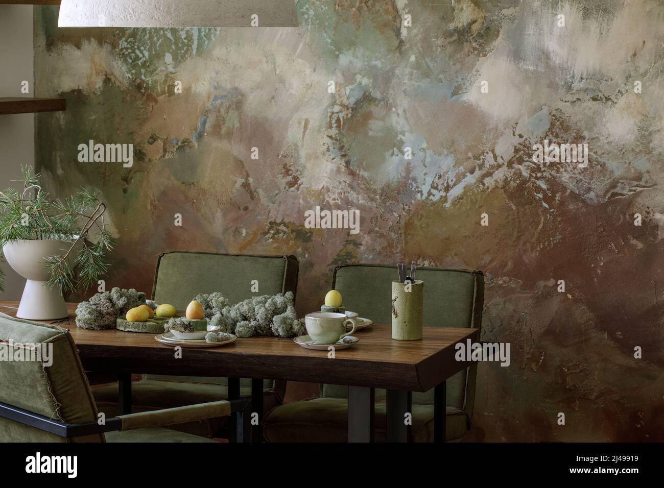 Table setting for Easter dinner decorated with forest moss, eggs ...